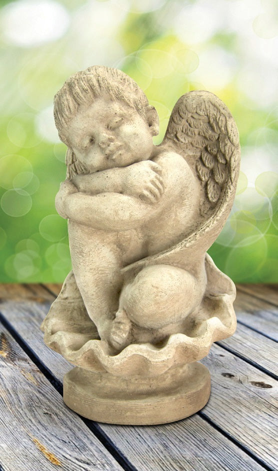 Li'l angel statue on seashell pompeii ash 32cm height | Royal Garden Centre